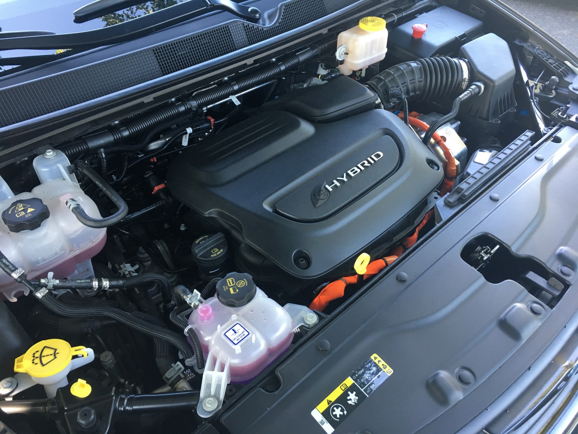 Plugging in Pacifica Hybrid: City drive review of its 32-mile electric ...