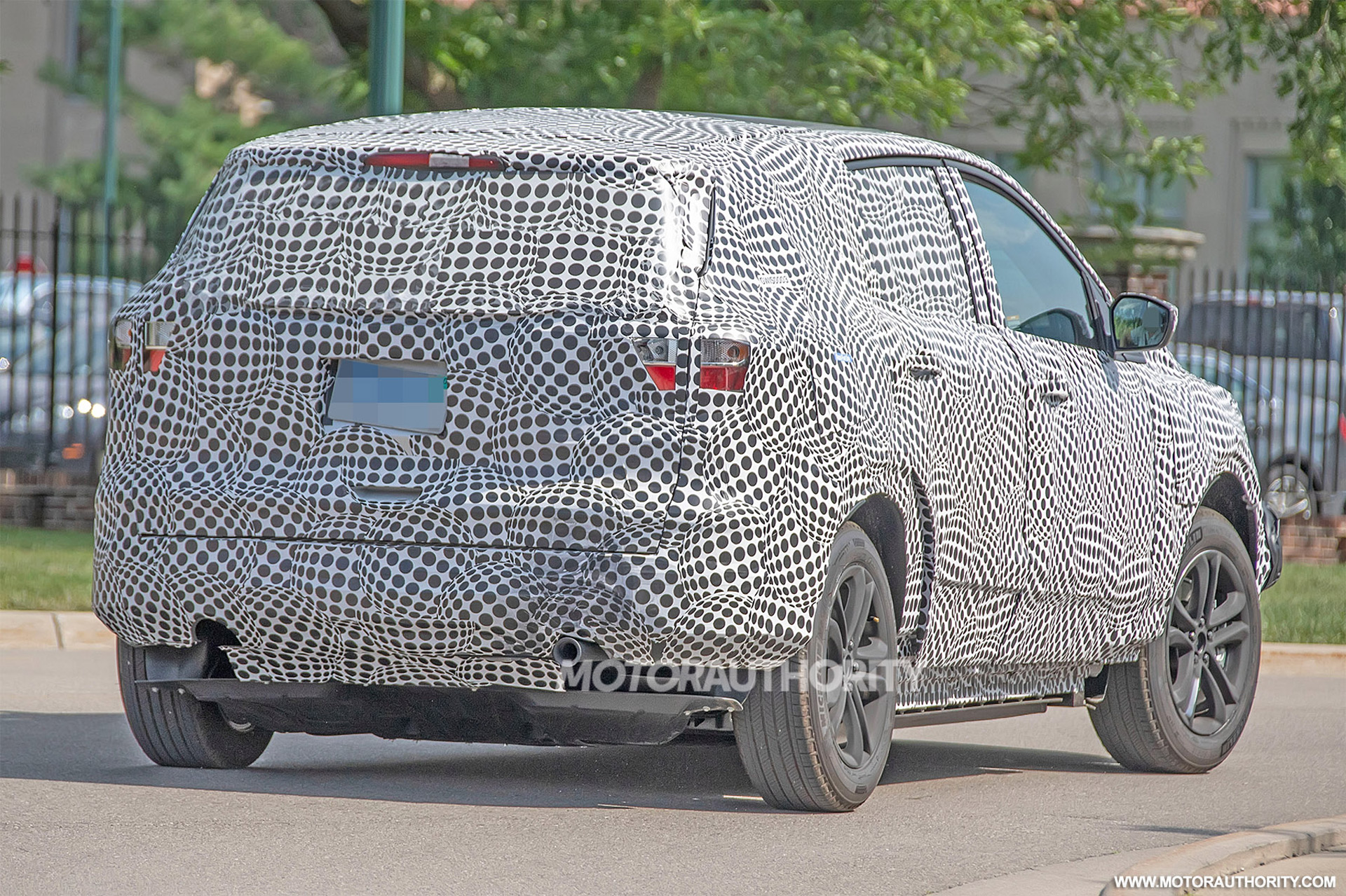 Ford says its Mustang-inspired electric crossover will "go like hell"