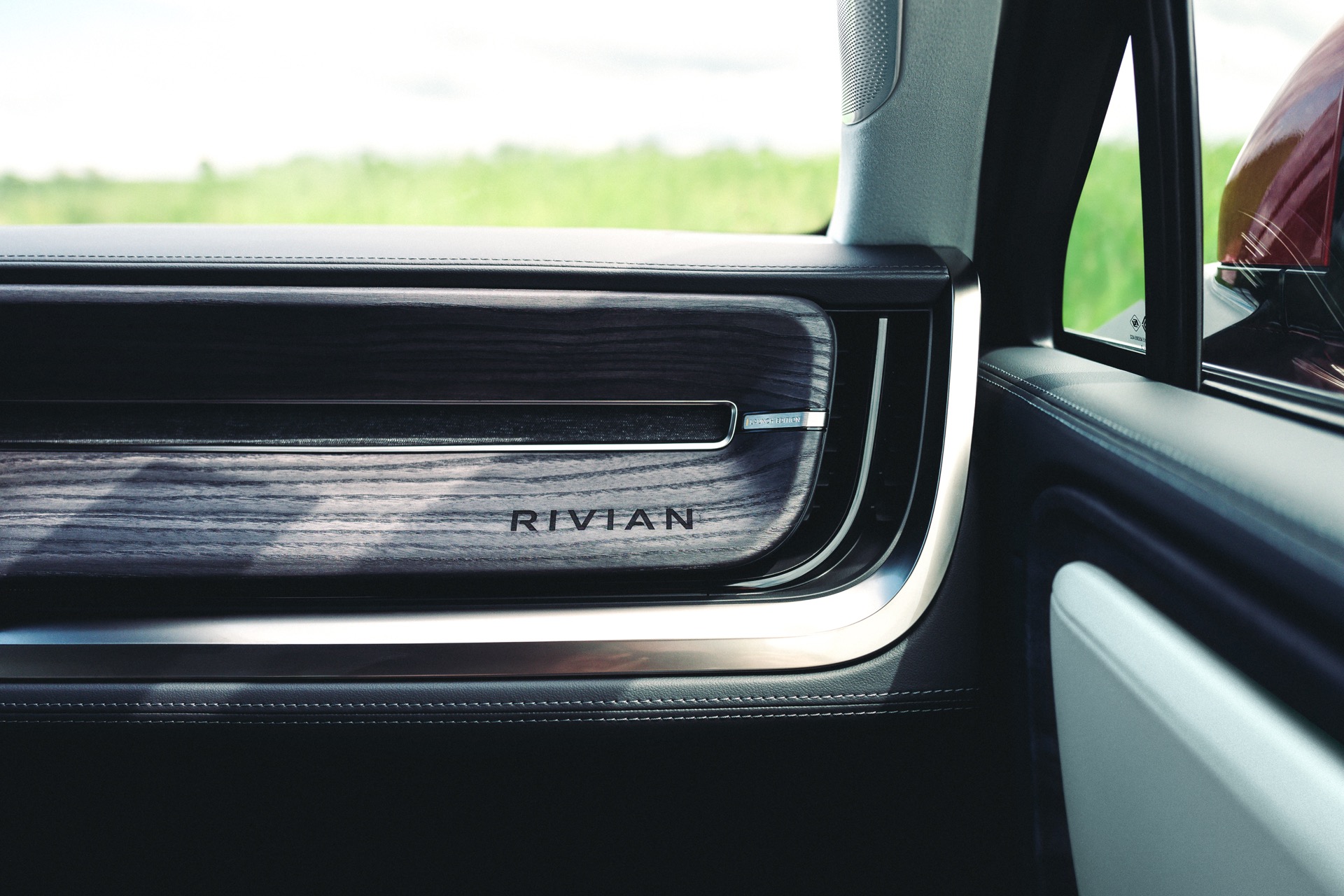 Rivian drops most affordable versions of its electric trucks, hiking ...
